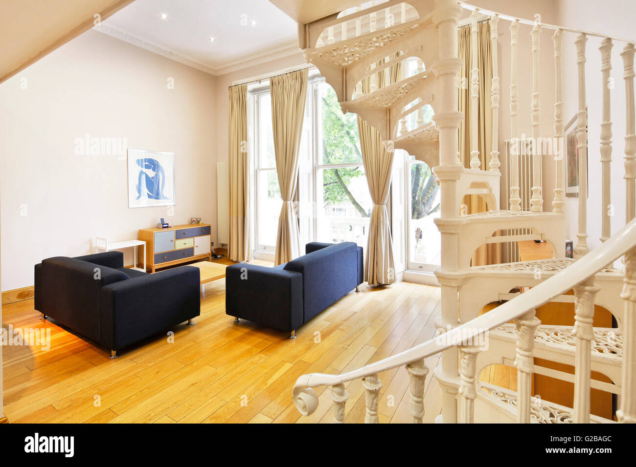 Inverness Terrace. Spacious living room with large windows. White ...