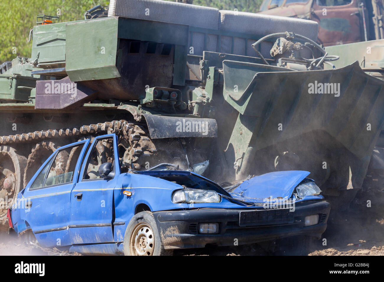 military tank crushes a blue car Stock Photo - Alamy
