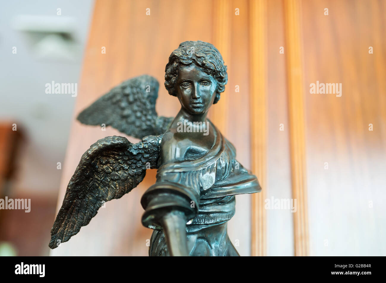 An Statue angel ancient symbol old face Stock Photo - Alamy