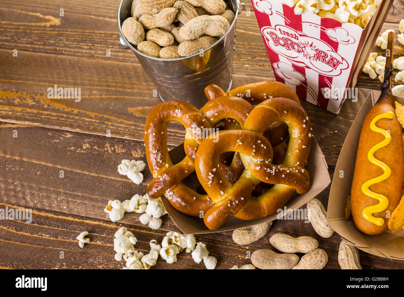 Game day traditional snacks included corndogs and salted peanuts on a ...