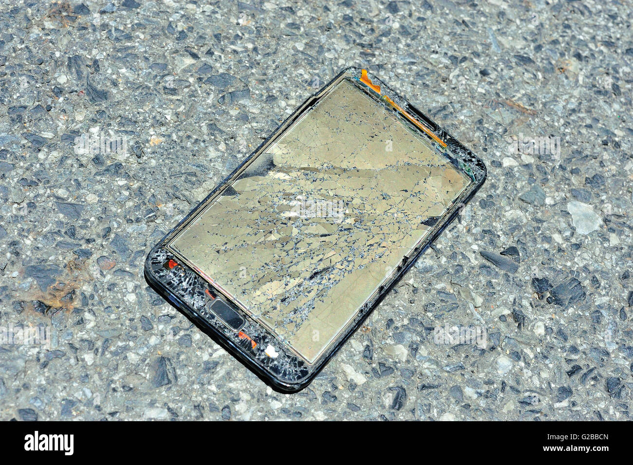 An Broken damage mobile in sun light Stock Photo - Alamy