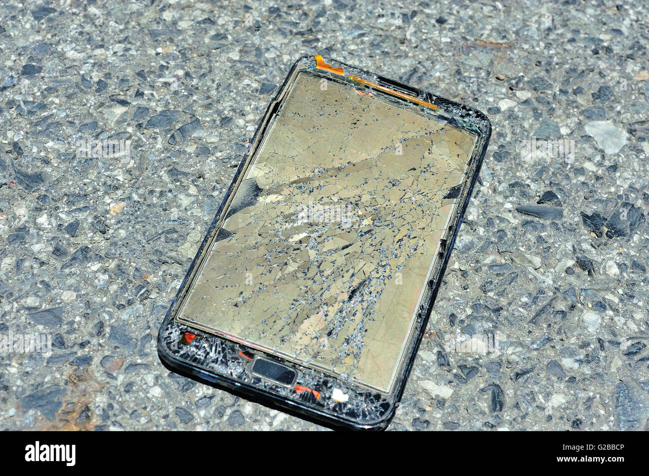 An Broken damage mobile in sun light Stock Photo - Alamy