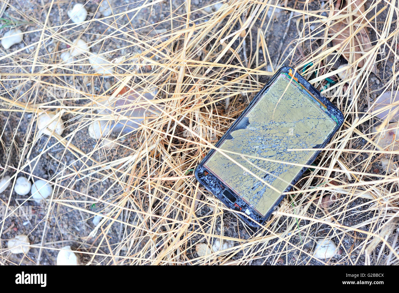 An Broken damage mobile in sun light Stock Photo - Alamy