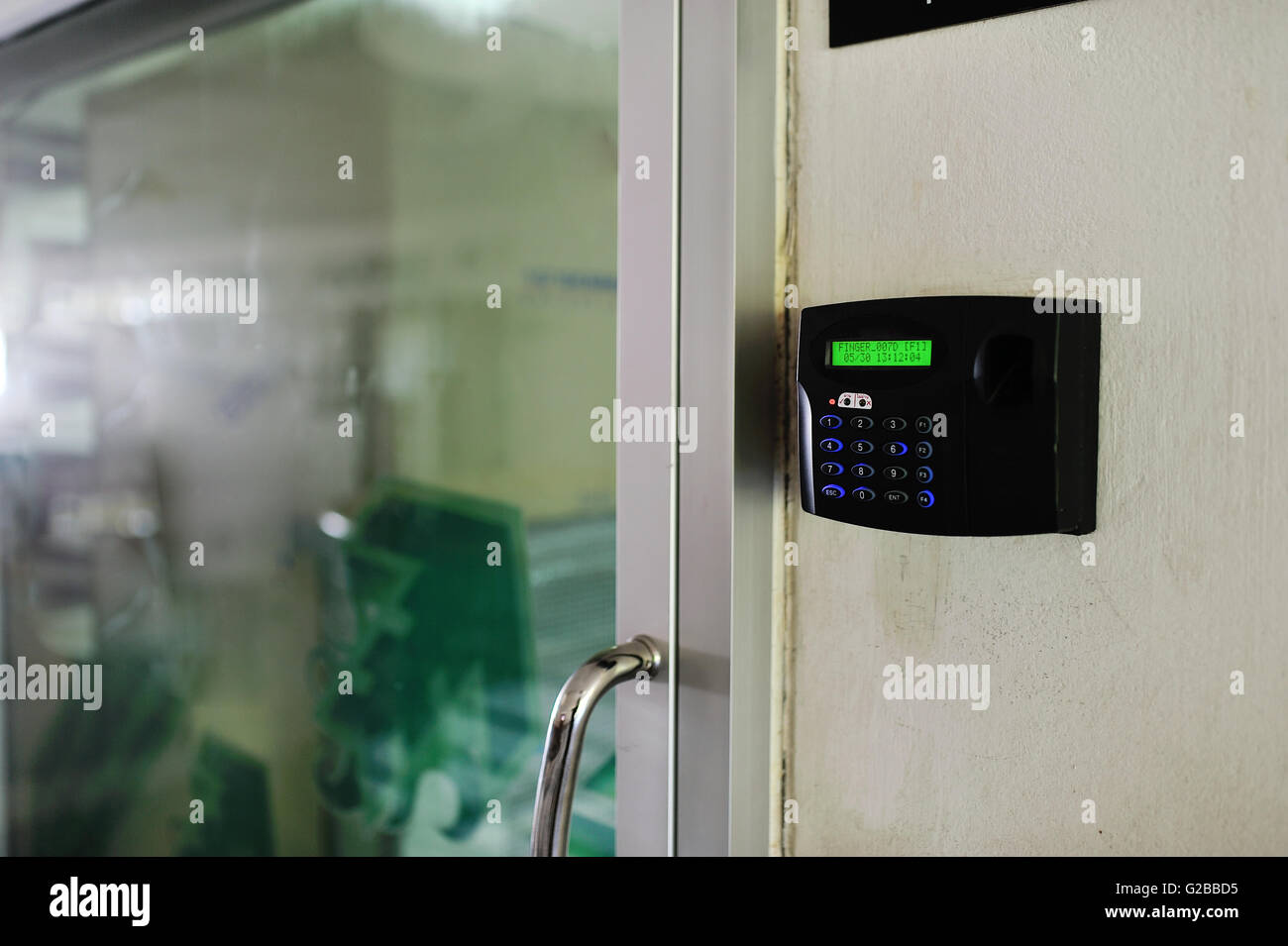 An Fingerprint machine server safety Stock Photo - Alamy