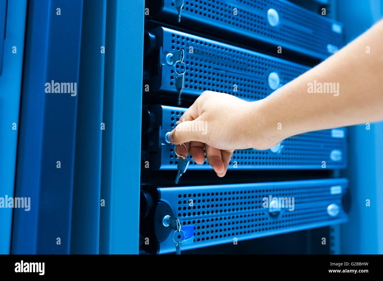 Man fix server network in data center room Stock Photo - Alamy