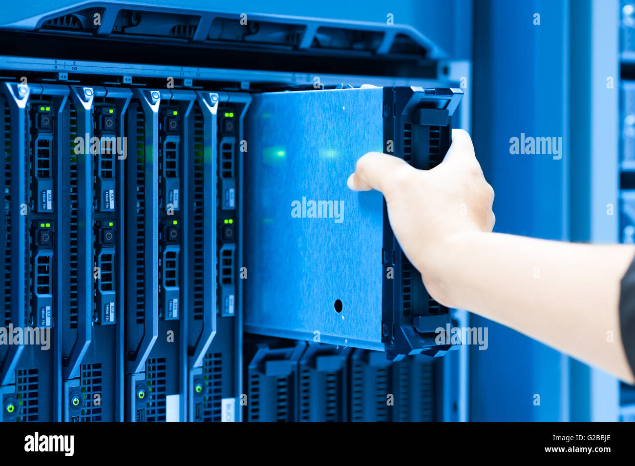 Man fix server network in data center room Stock Photo - Alamy