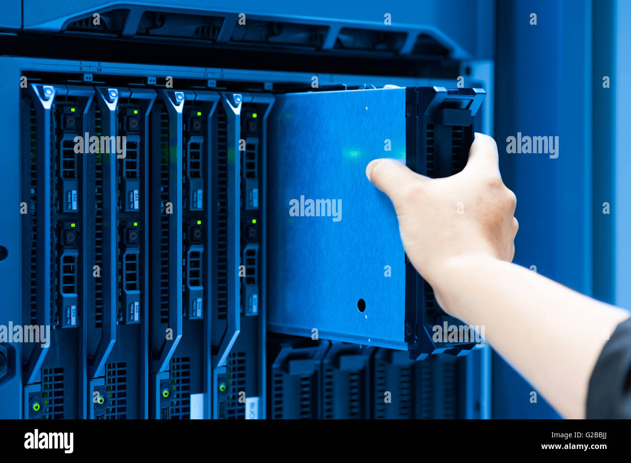 Man fix server network in data center room Stock Photo - Alamy