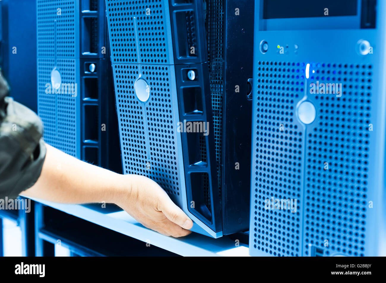 Man fix server network in data center room Stock Photo - Alamy