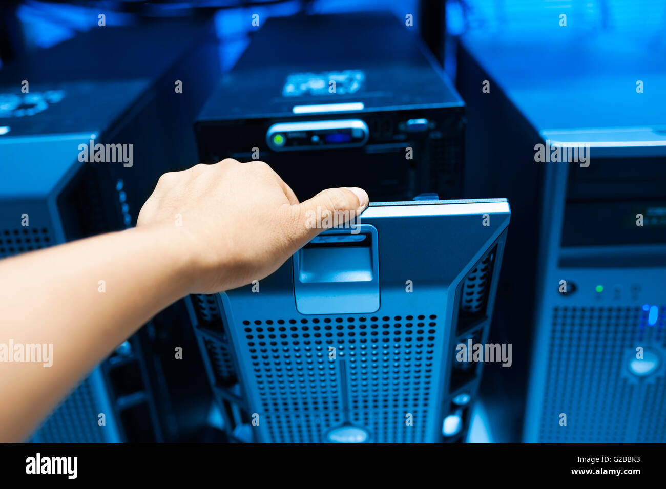 Man fix server network in data center room Stock Photo - Alamy