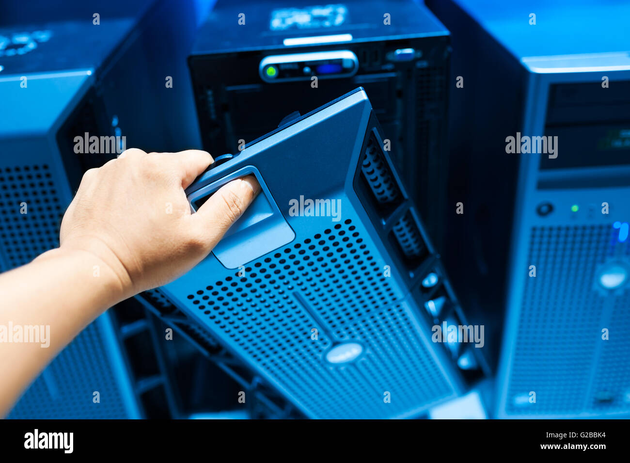 Man fix server network in data center room Stock Photo - Alamy