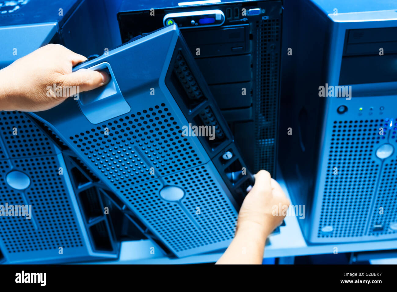 Man fix server network in data center room Stock Photo - Alamy