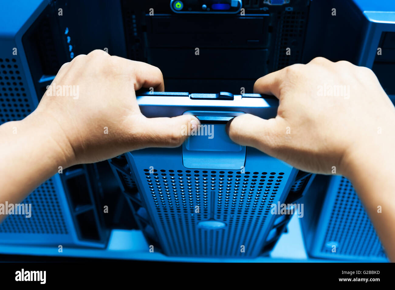Man fix server network in data center room Stock Photo - Alamy