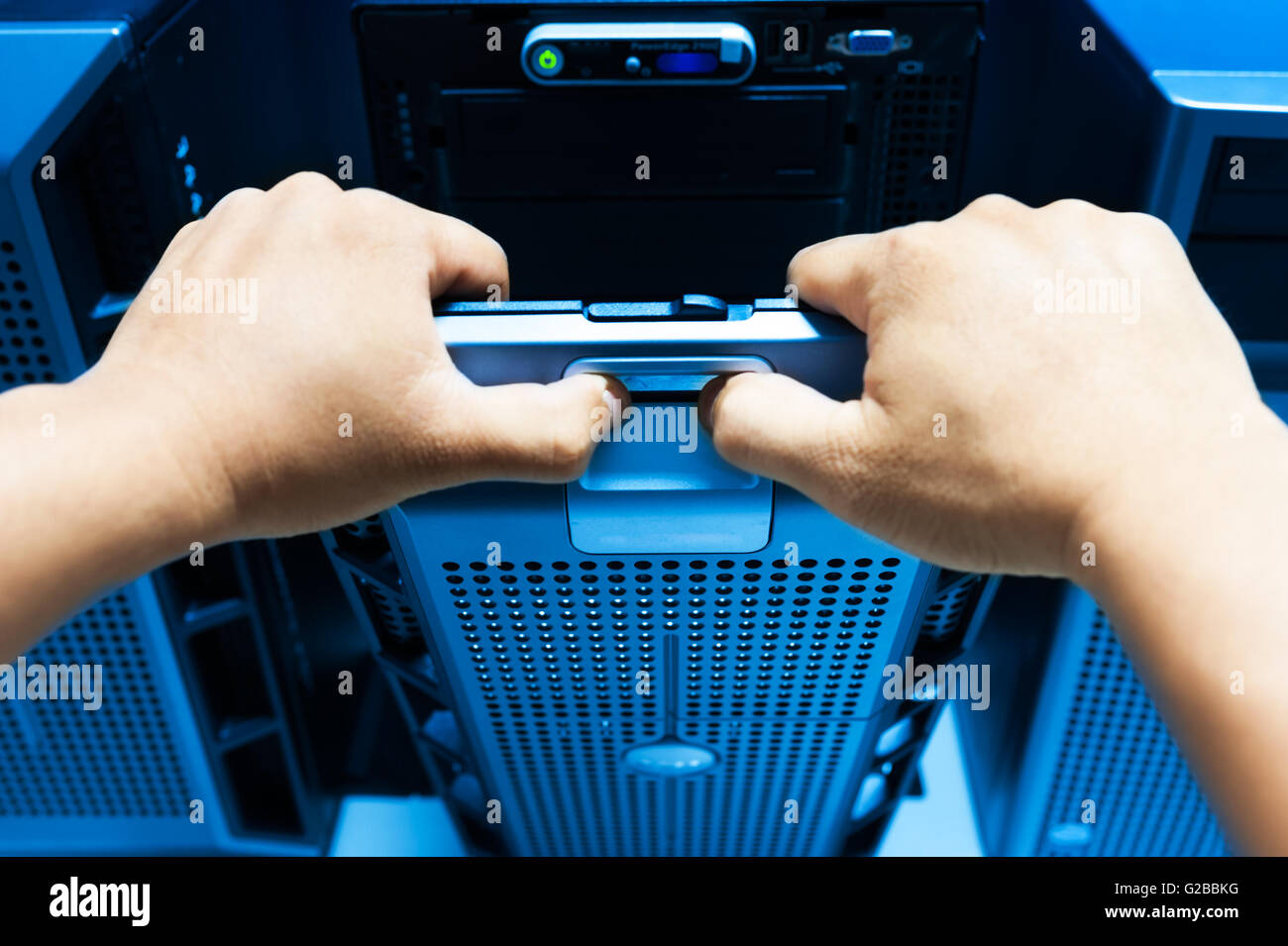 Man fix server network in data center room Stock Photo - Alamy