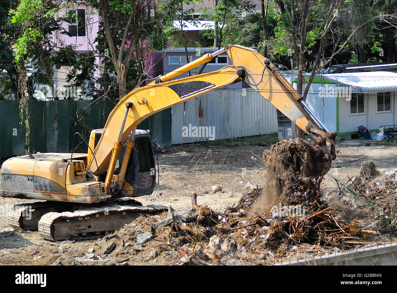 An excavator on a construction site Stock Photo - Alamy