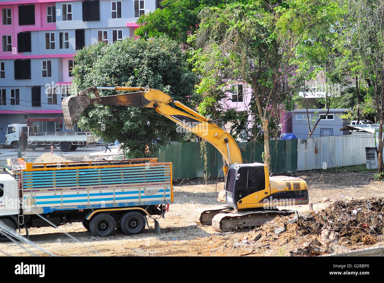 An excavator on a construction site Stock Photo - Alamy