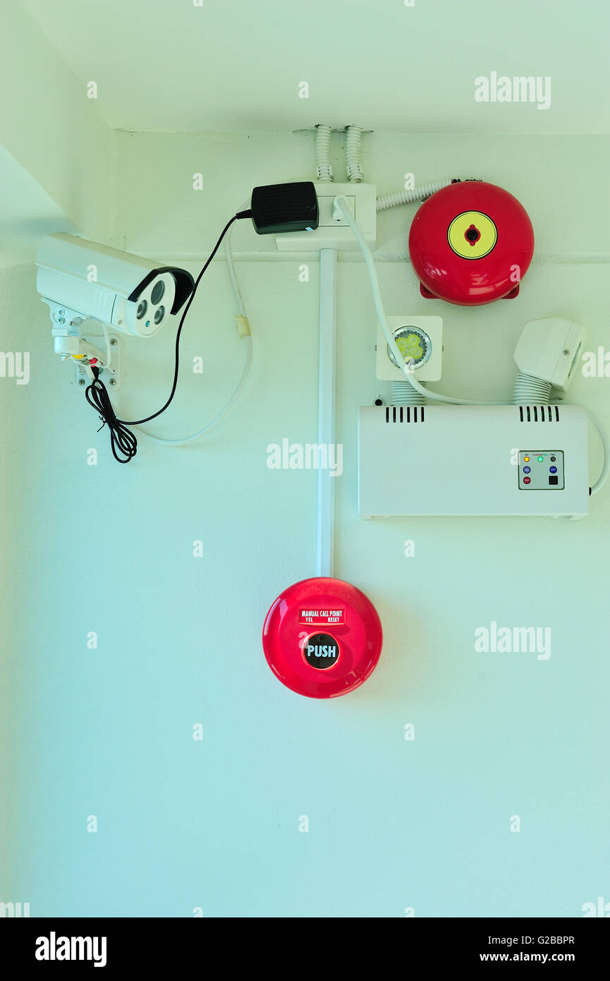 An Fire Alarm near door fire with cctv Stock Photo - Alamy