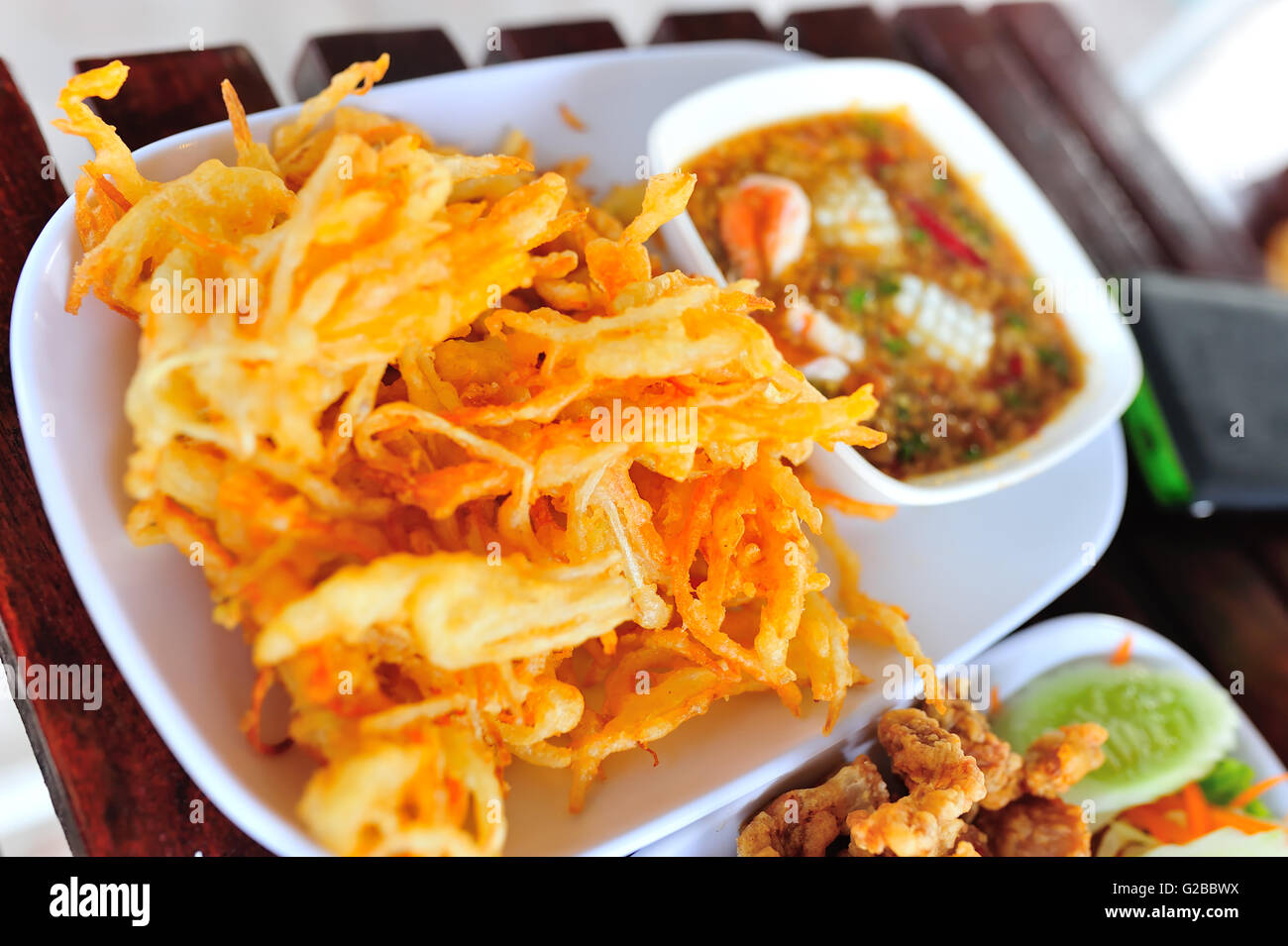 An Papaya salad fried in soft light Stock Photo - Alamy