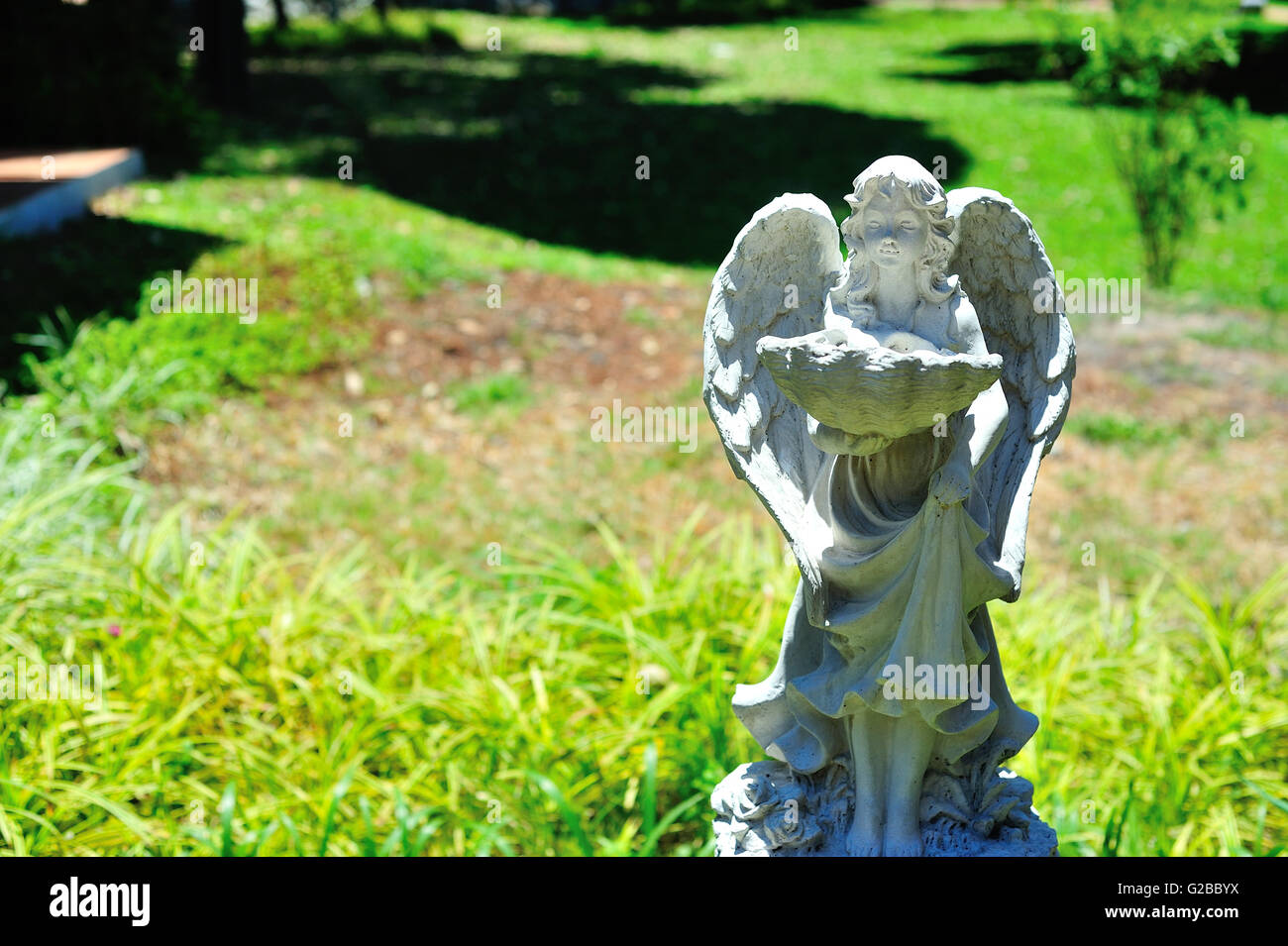 An Statue angel ancient symbol old face Stock Photo - Alamy