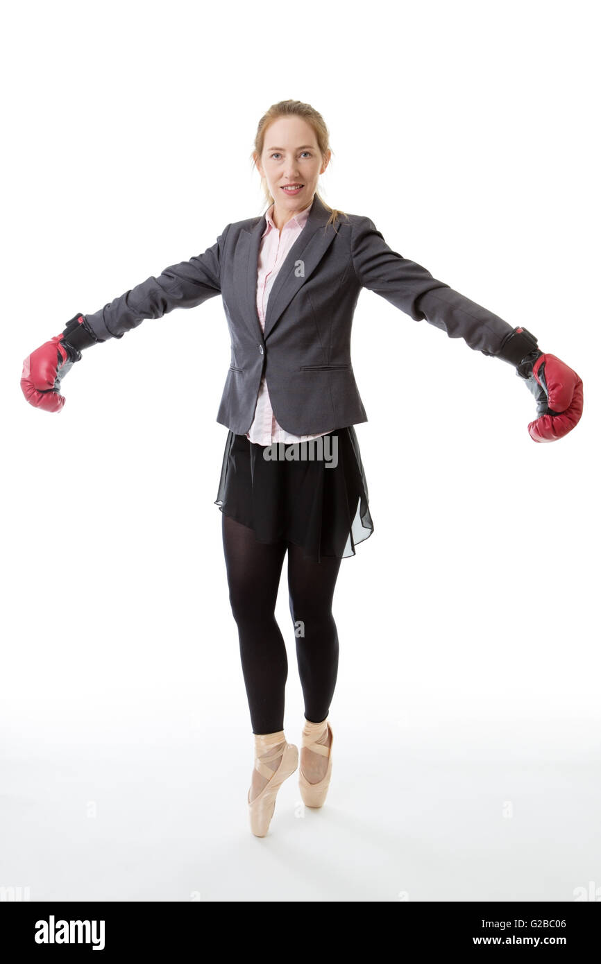 Full length studio shot of a business ballerina en pointe wearing red ...