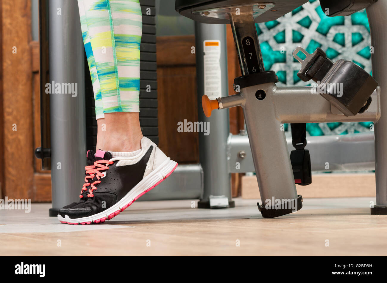 Close-up with woman feet wearing training shoes in the gym Stock Photo ...