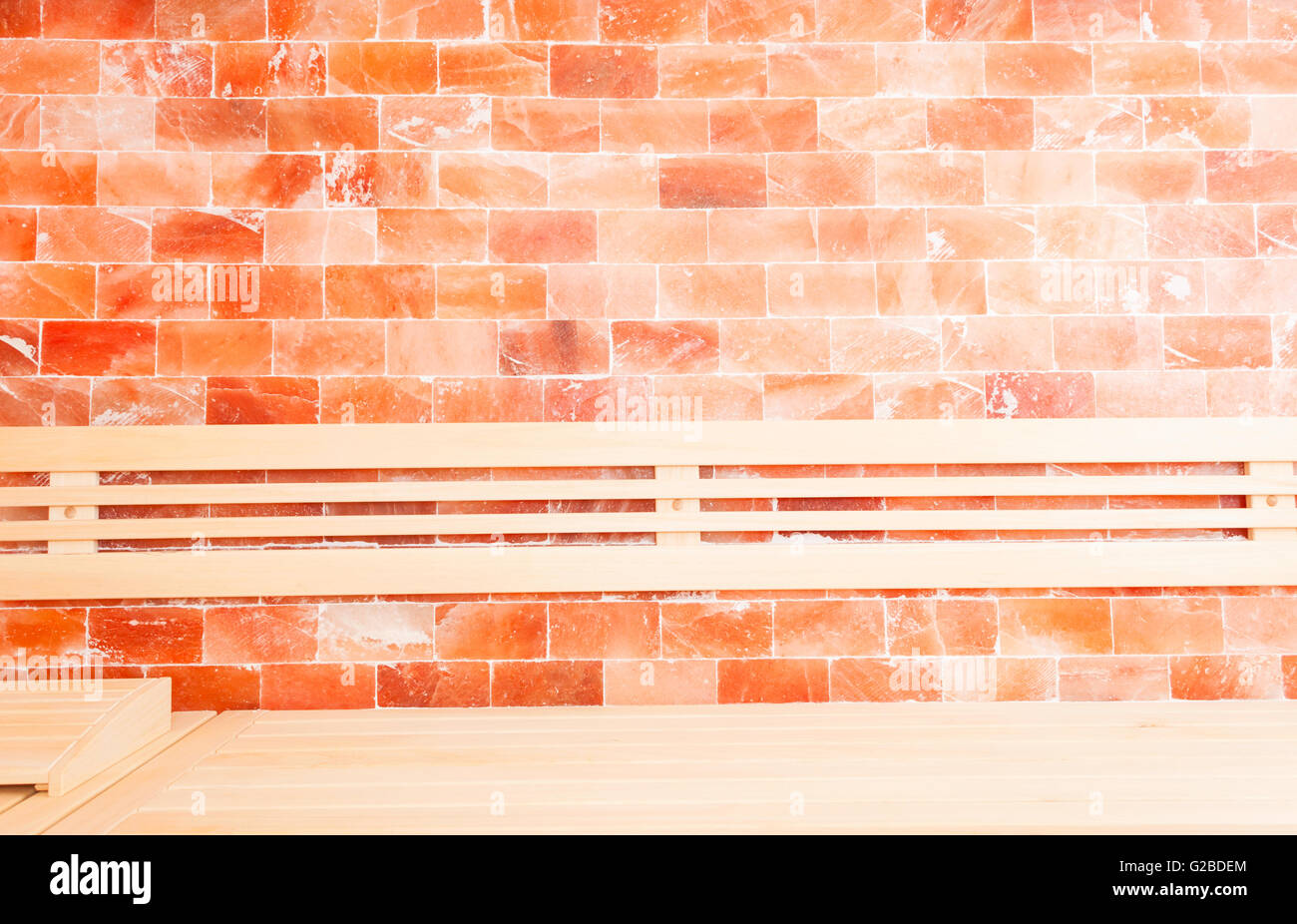 Wooden bench on hymalayan salt wall decoration in sauna room Stock ...