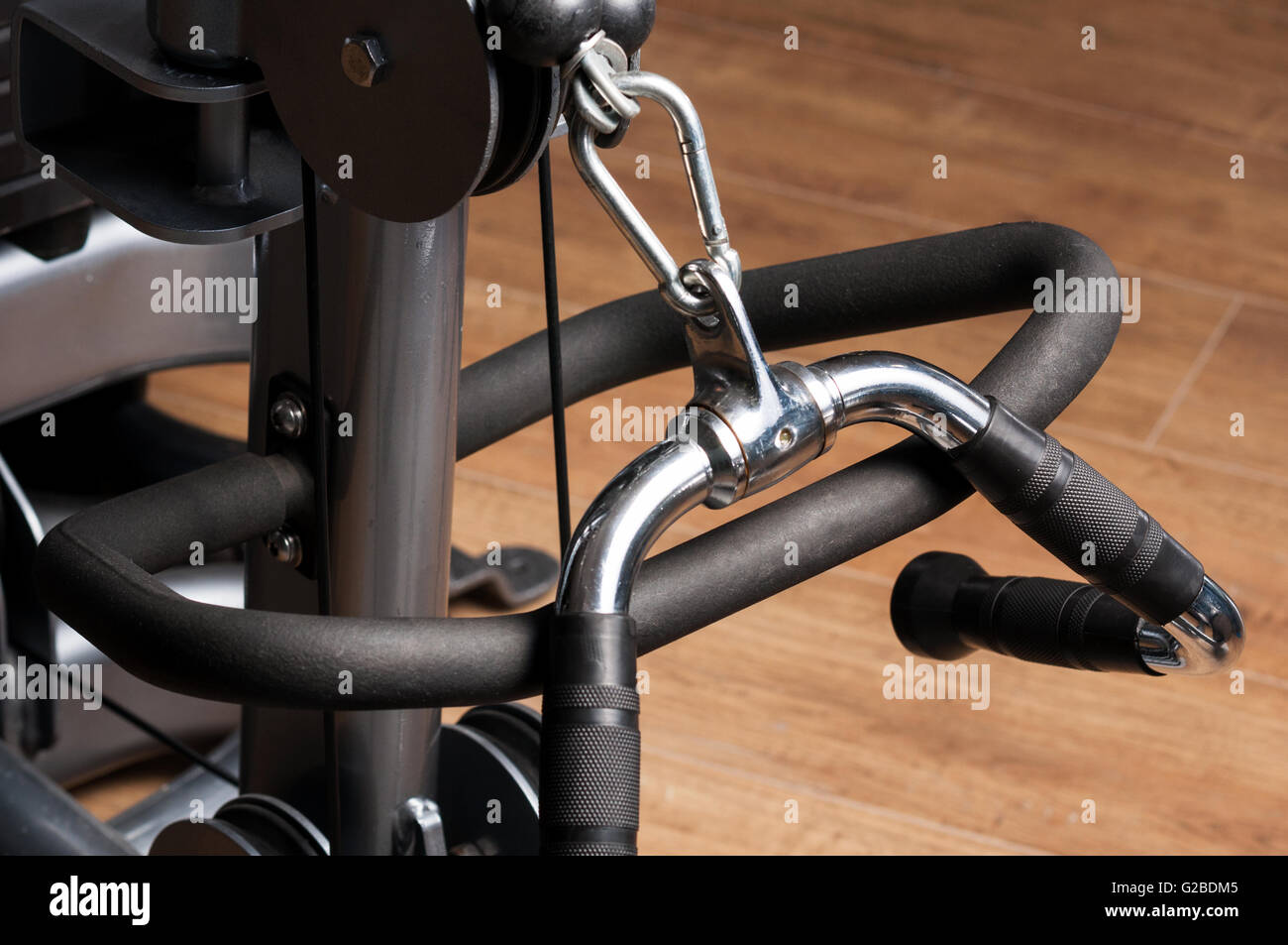 Close-up of steel handle machine for biceps training as exercising ...