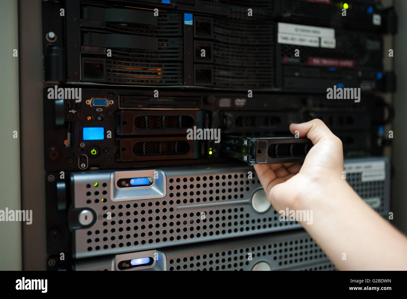 Man fix server network in data center room Stock Photo - Alamy