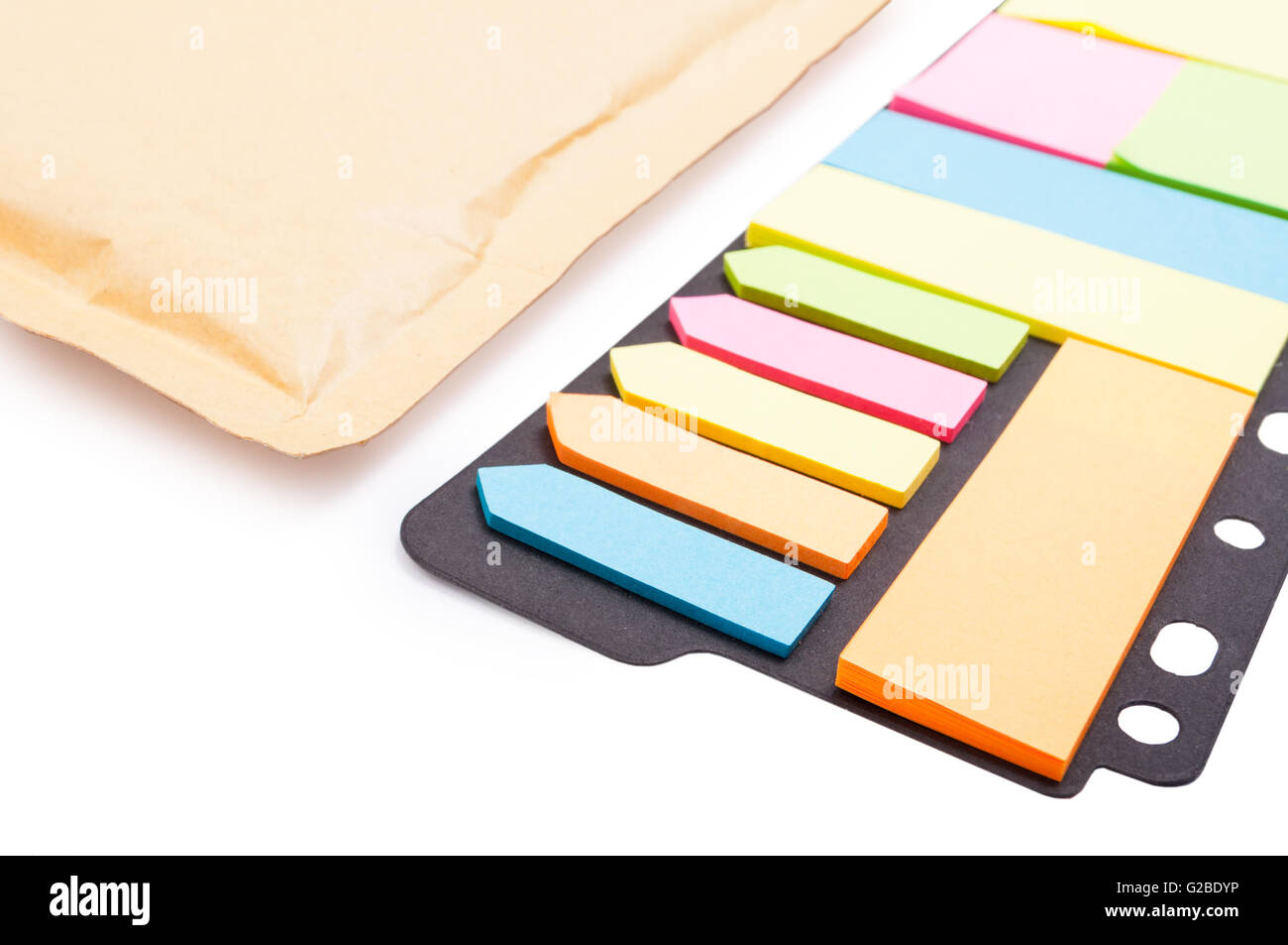 Colorful blank post-it paper in closeup on white background as memo and ...