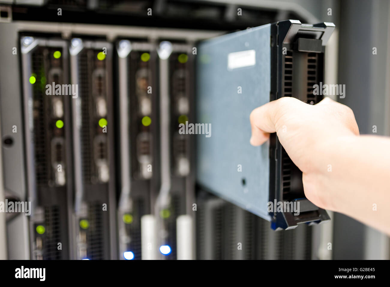 Man fix server network in data center room Stock Photo - Alamy