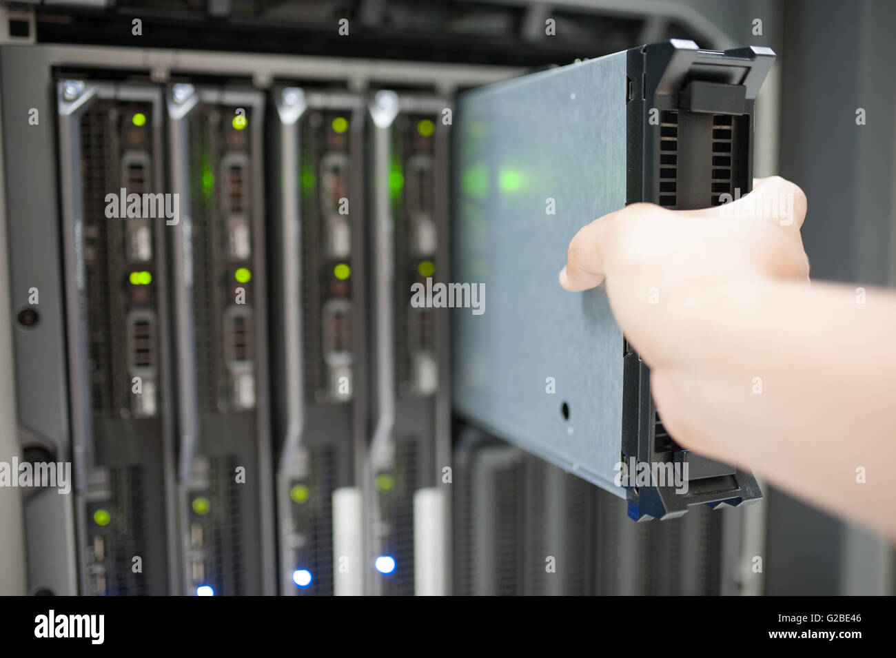 Man fix server network in data center room Stock Photo - Alamy