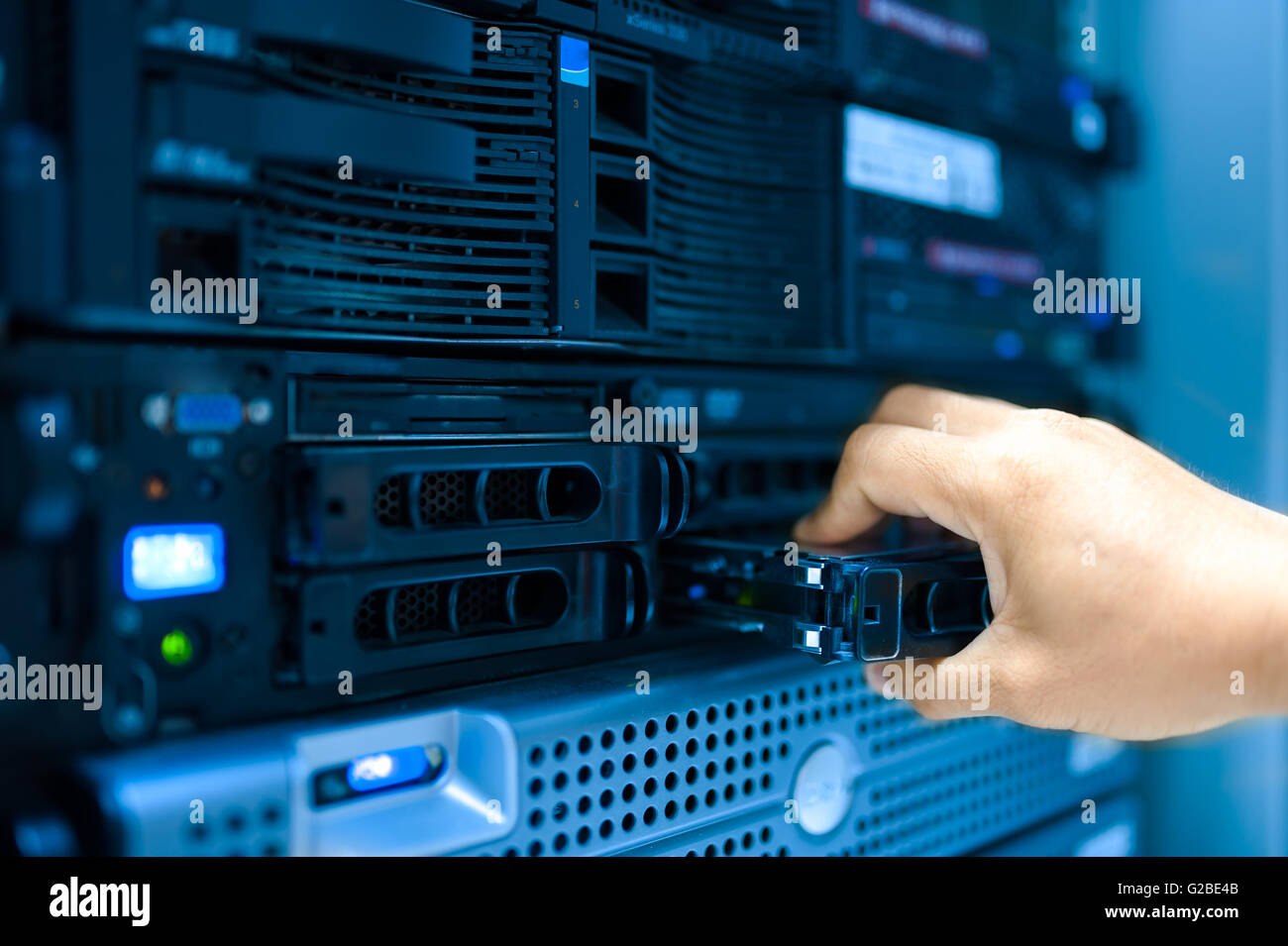 Man fix server network in data center room Stock Photo - Alamy