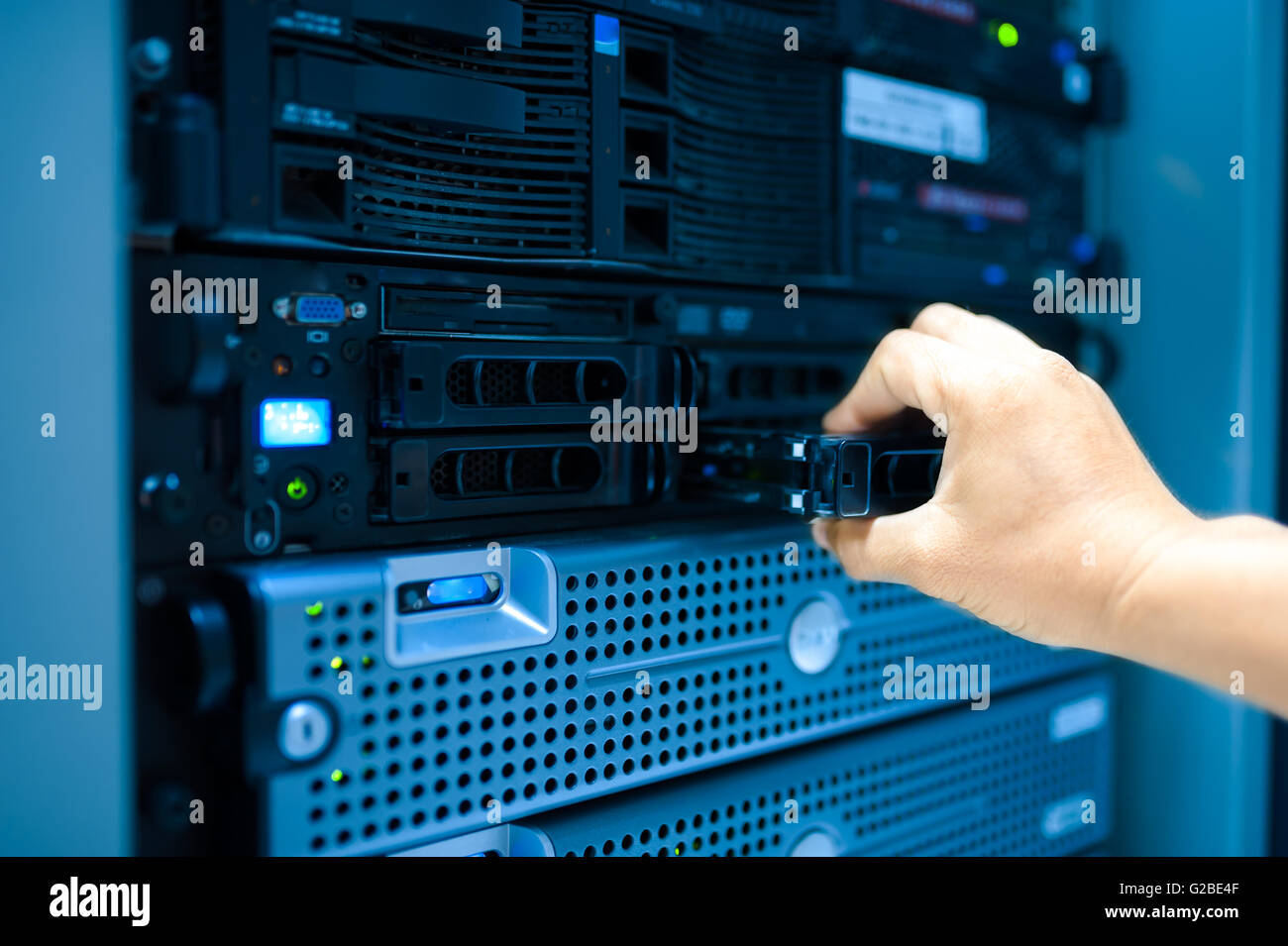 Man fix server network in data center room Stock Photo - Alamy