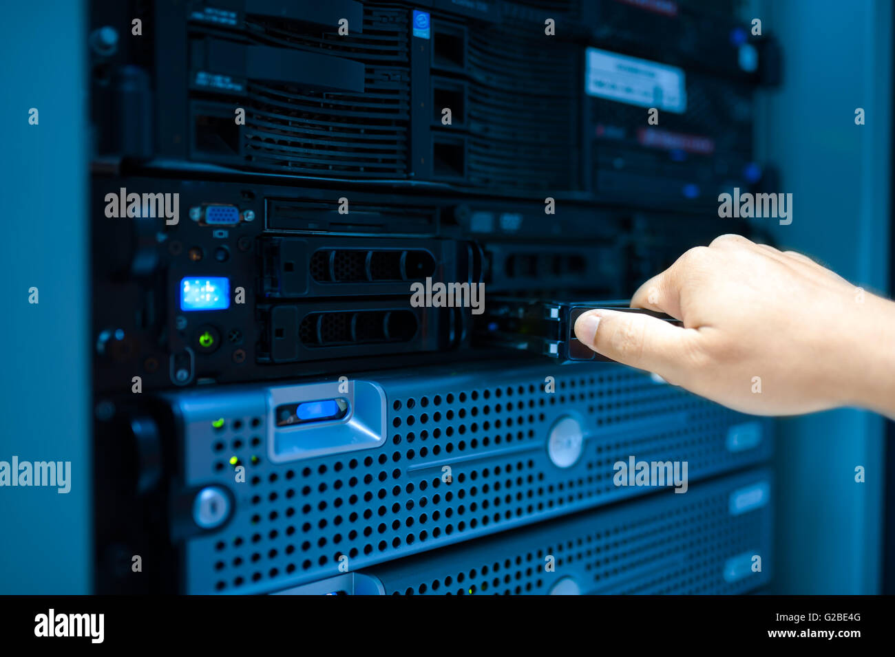 Man fix server network in data center room Stock Photo - Alamy