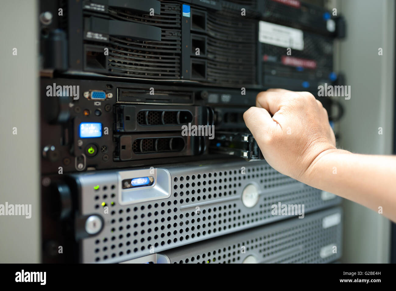 Man fix server network in data center room Stock Photo - Alamy