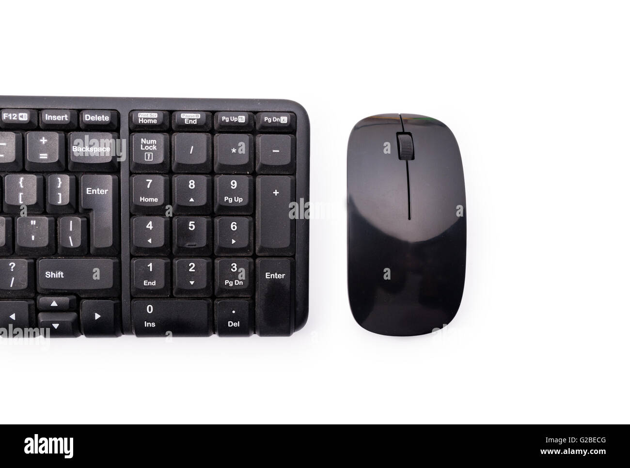 Close-up of workplace with black keyboard and mouse on blank white ...