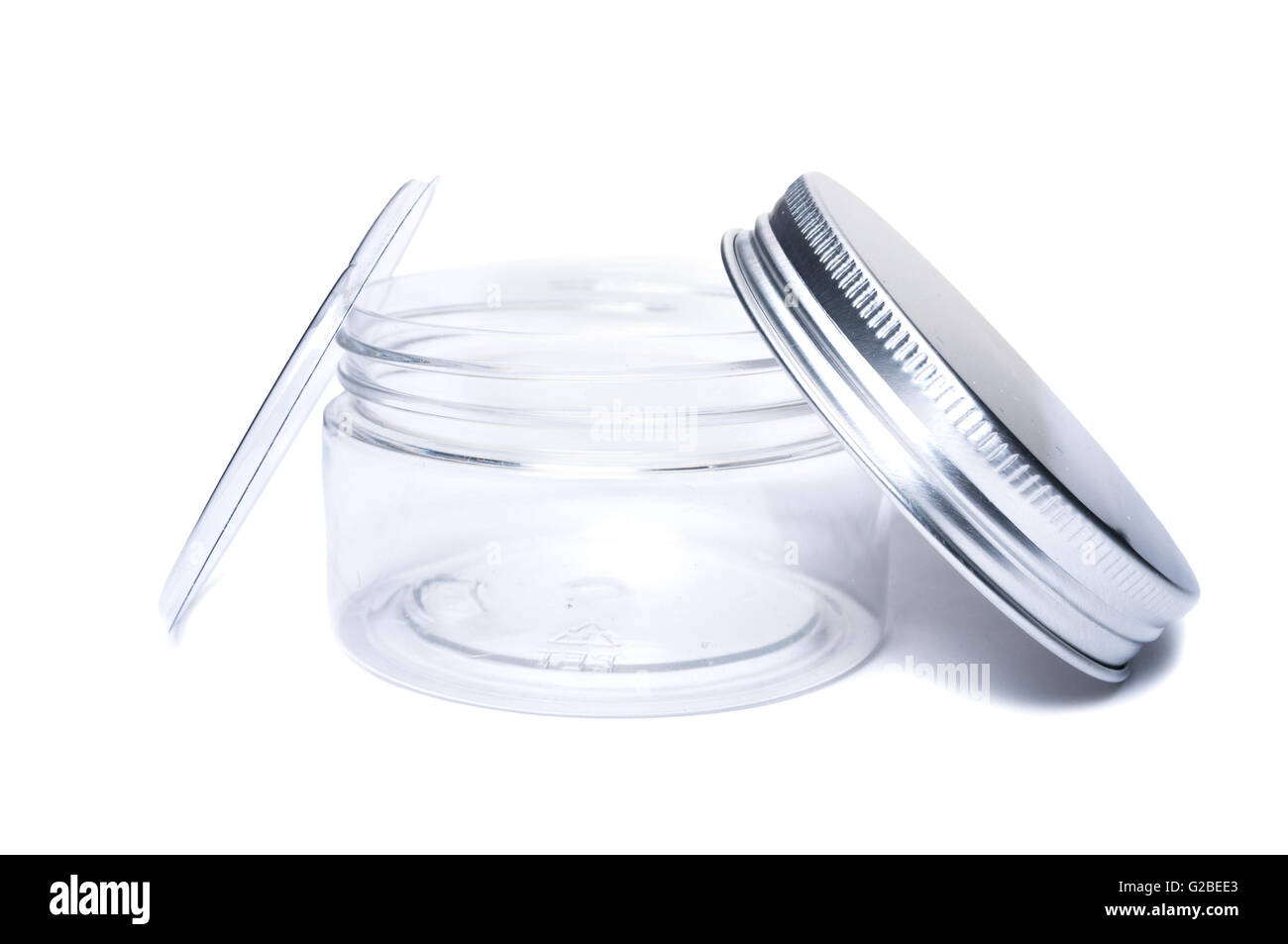 New isolated transparent plastic jar with metal lid or cap isolated on ...