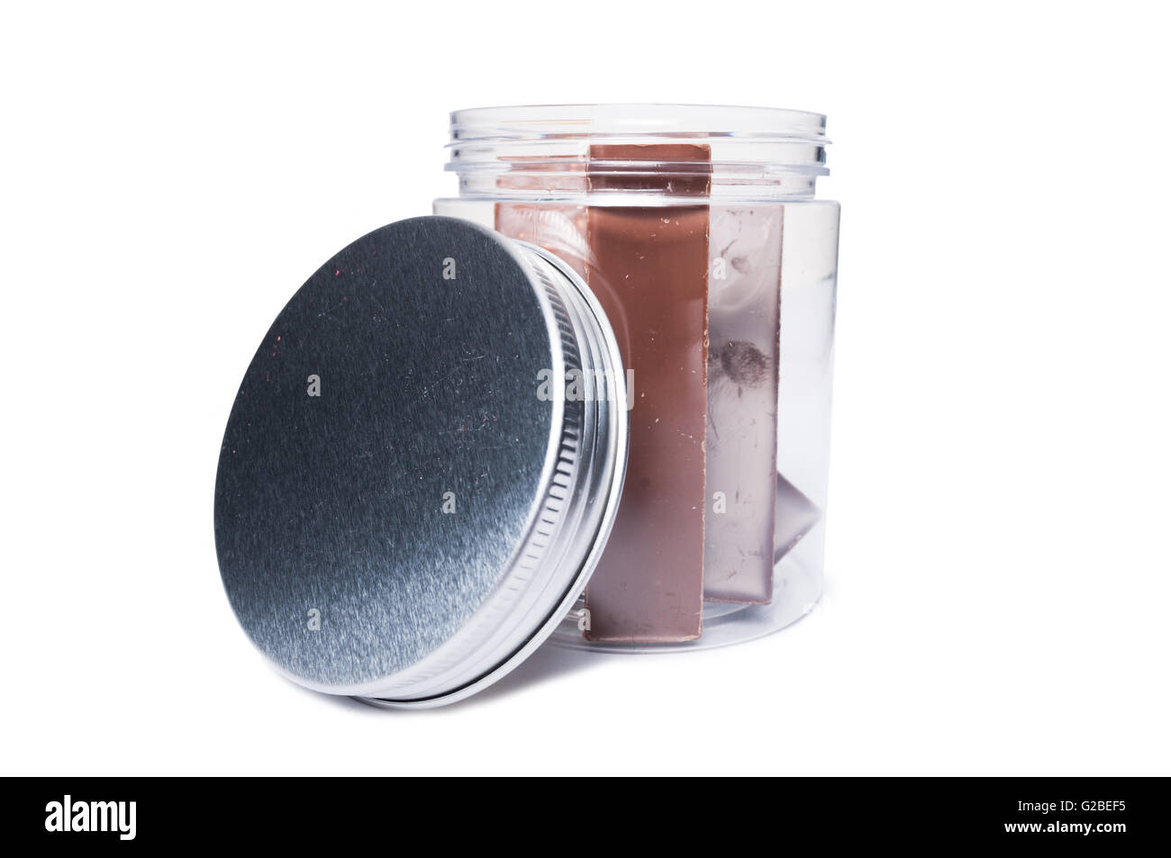 Chocolate bars in transparent kitchen storage container or jar isolated ...