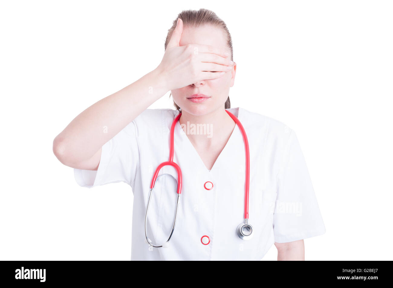 Medical woman doctor covering her eyes with hand as hiding concept ...