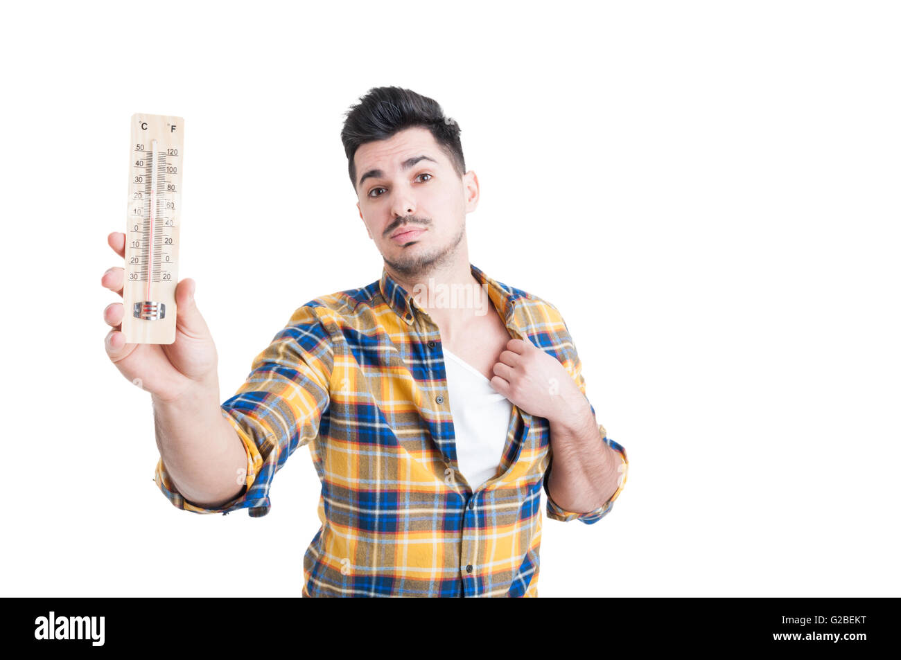 Attractive Young Man Holding A Thermometer And Sweating As High