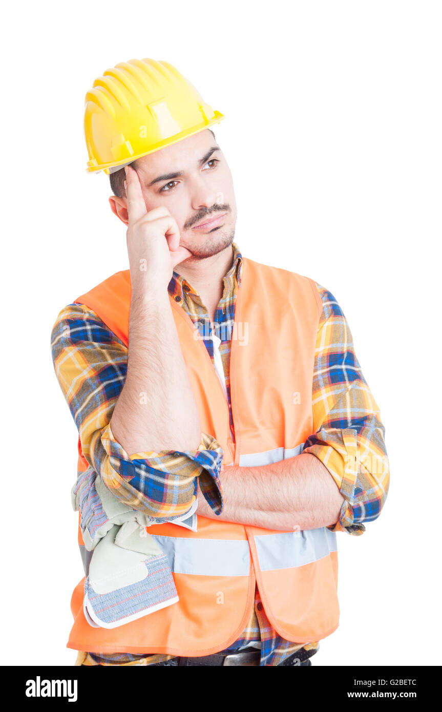 Attractive constructor or builder thinking and looking away while ...