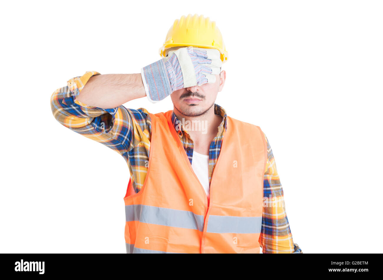 Portrait of attractive engineer covering his eyes or see no evil ...