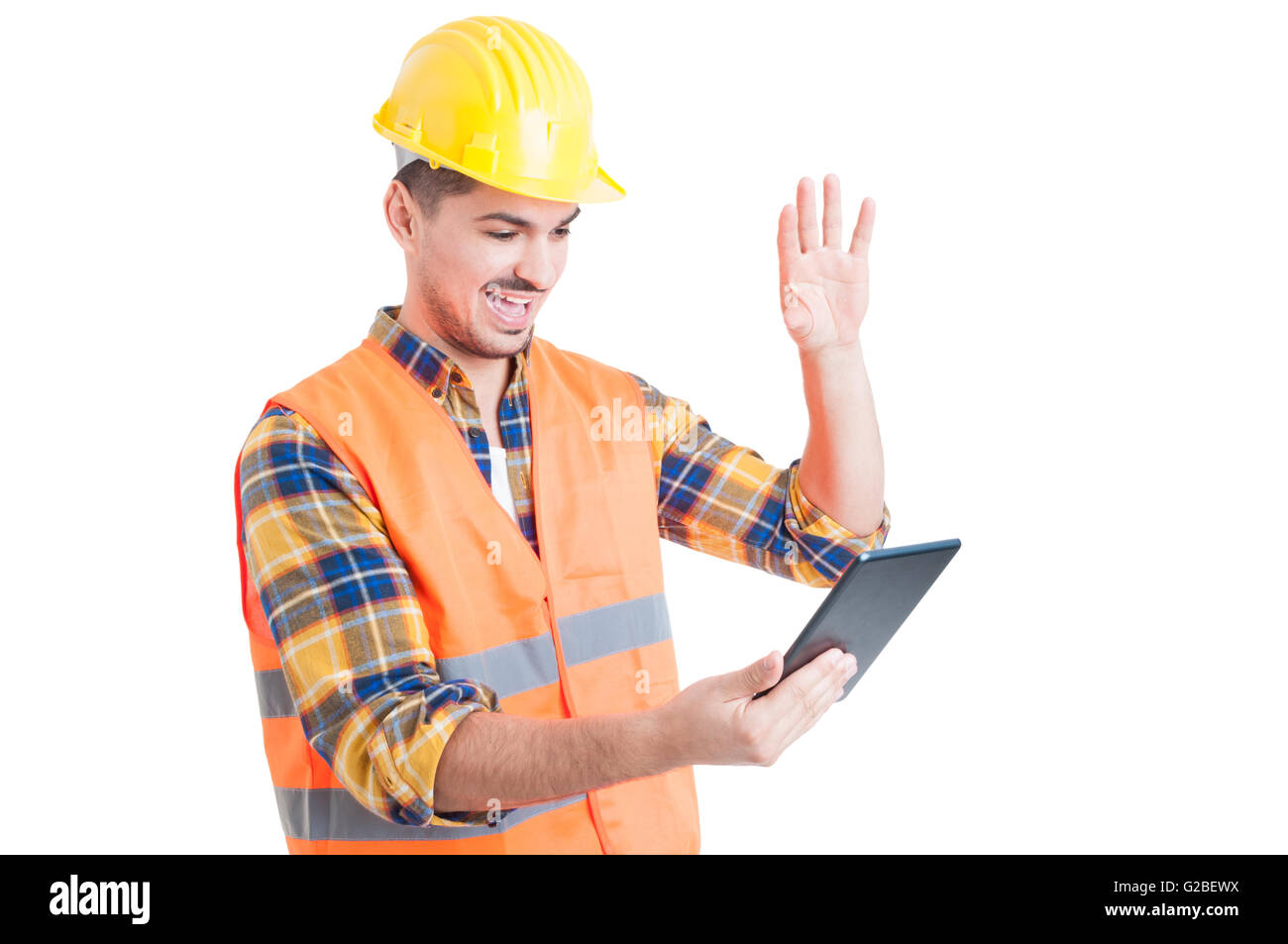 Happy engineer rising hand and salute while holding a tablet as welcome ...