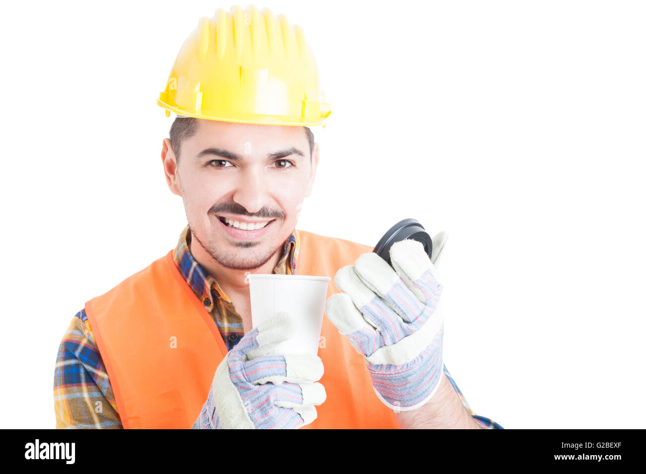 Close-up portrait of happy handsome engineer with a cup of coffee in ...