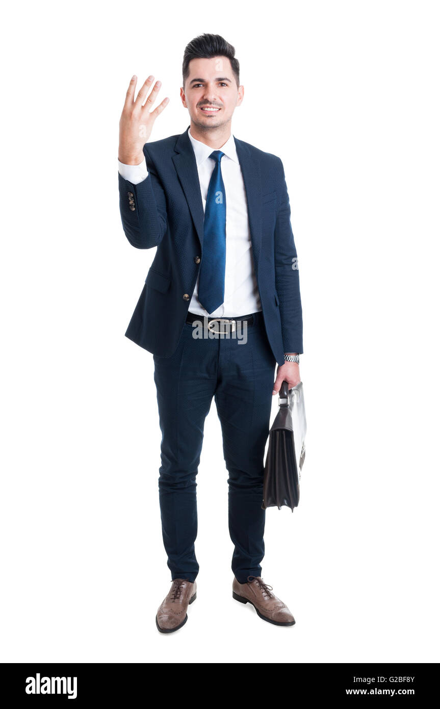 Sales man standing holding briefcase and showing number four while ...