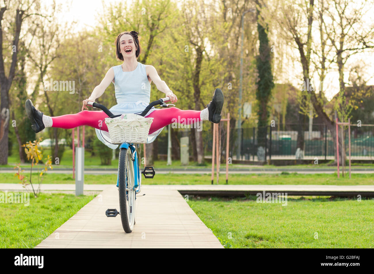 Legs beautiful woman on bicycle hi-res stock photography and images - Alamy
