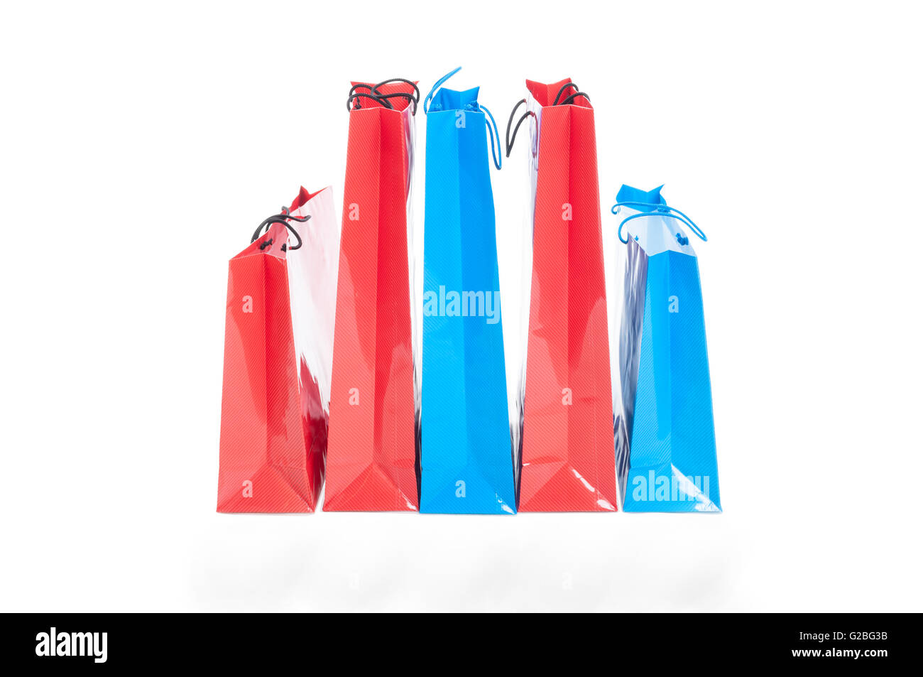 Shopping paper bags in different size and colors isolated on white ...