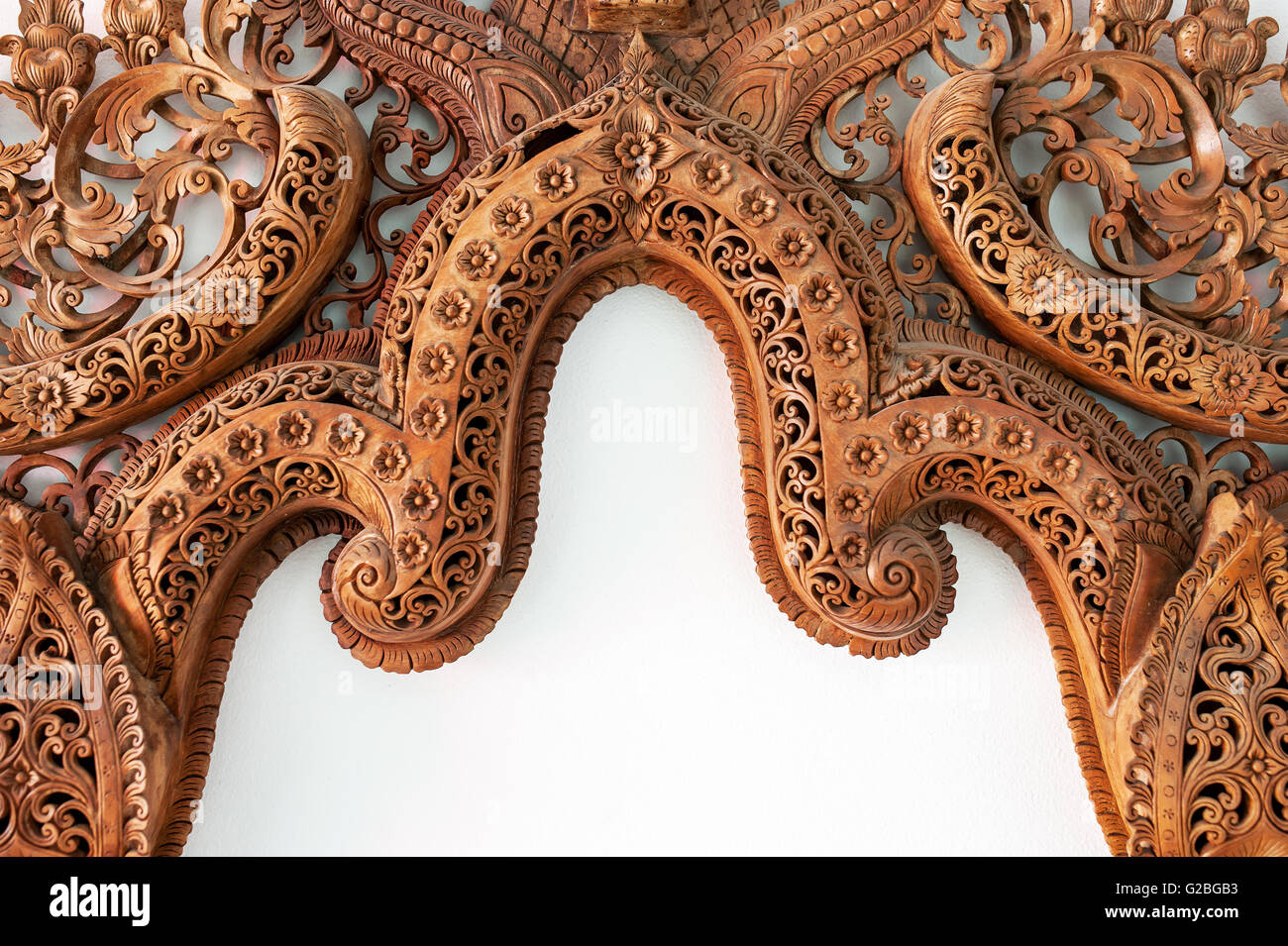 Carved flower line thai with soft light Stock Photo - Alamy