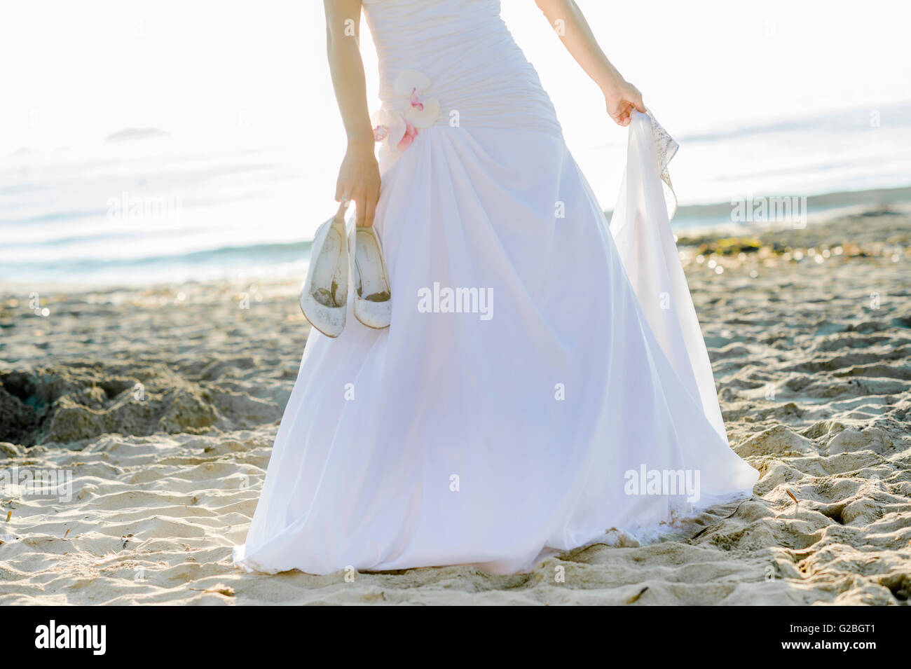 Carrying womans shoes hi-res stock photography and images - Alamy