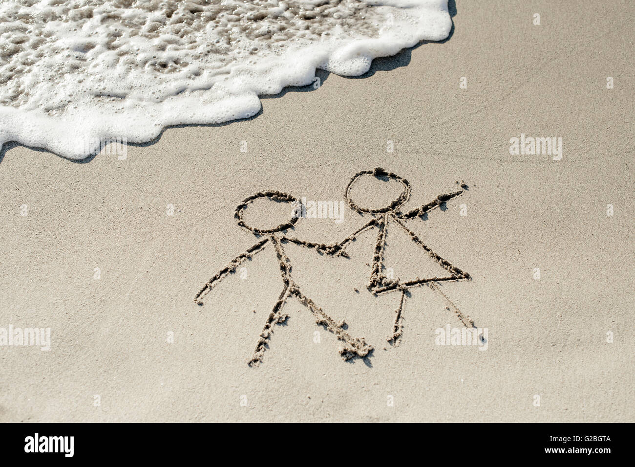 Hands sand hold beach sandy hi-res stock photography and images - Alamy