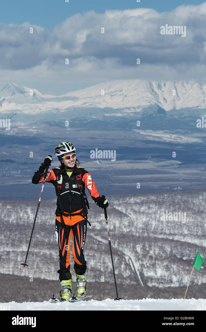 Ski mountaineer climb the mountain on skis. Vertical race ski ...
